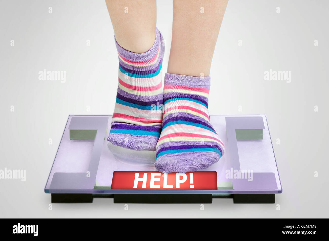 Help word on grey scales Stock Photo - Alamy