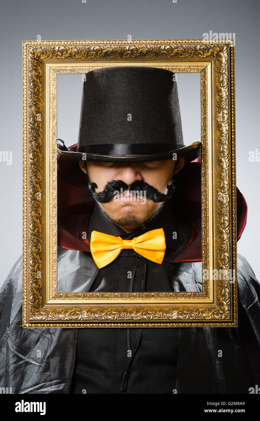 Funny man with picture frame Stock Photo - Alamy