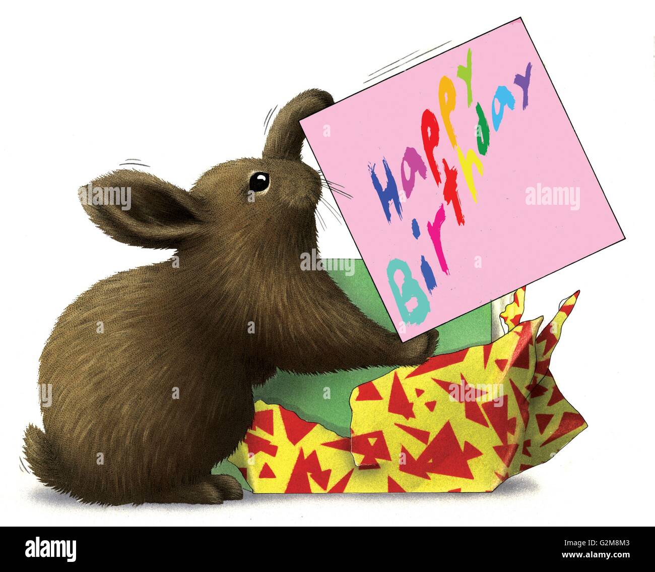 Rabbit holding birthday card Stock Photo - Alamy