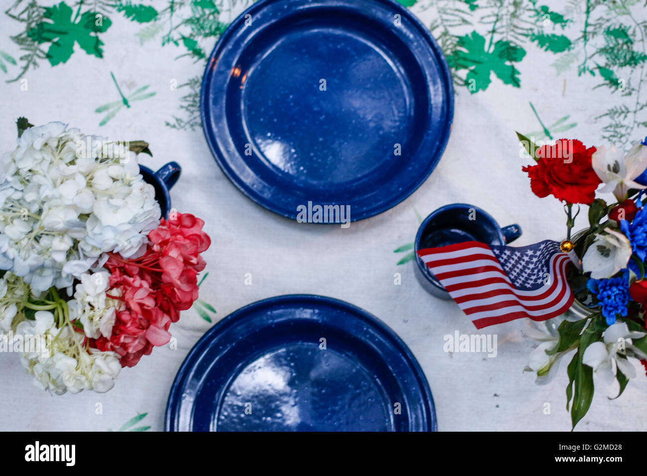 Table set for camping with American flags Stock Photo - Alamy
