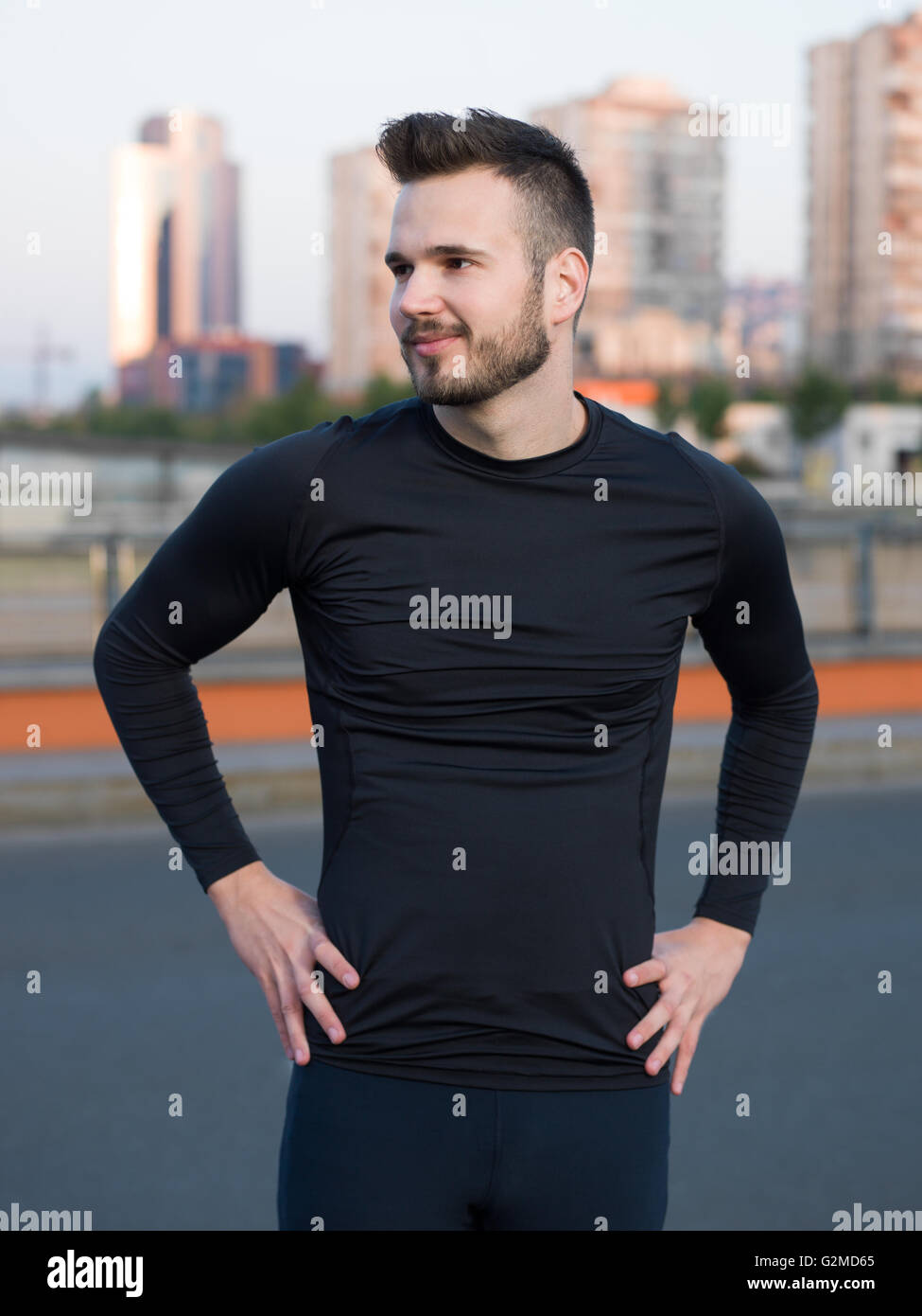 Portrait Of Male Runner On Urban Street Stock Photo - Alamy