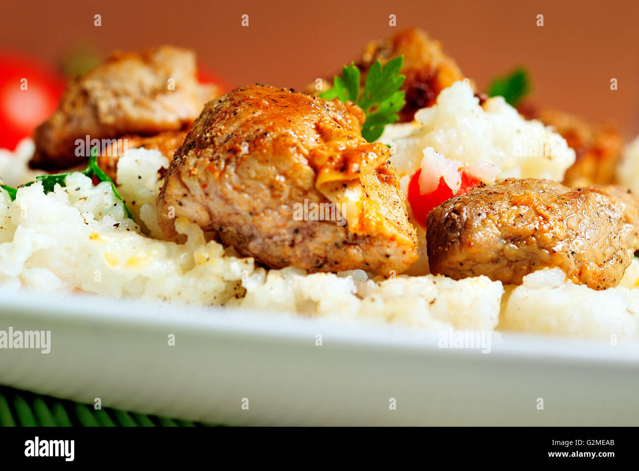 Rice with meat on table Stock Photo - Alamy