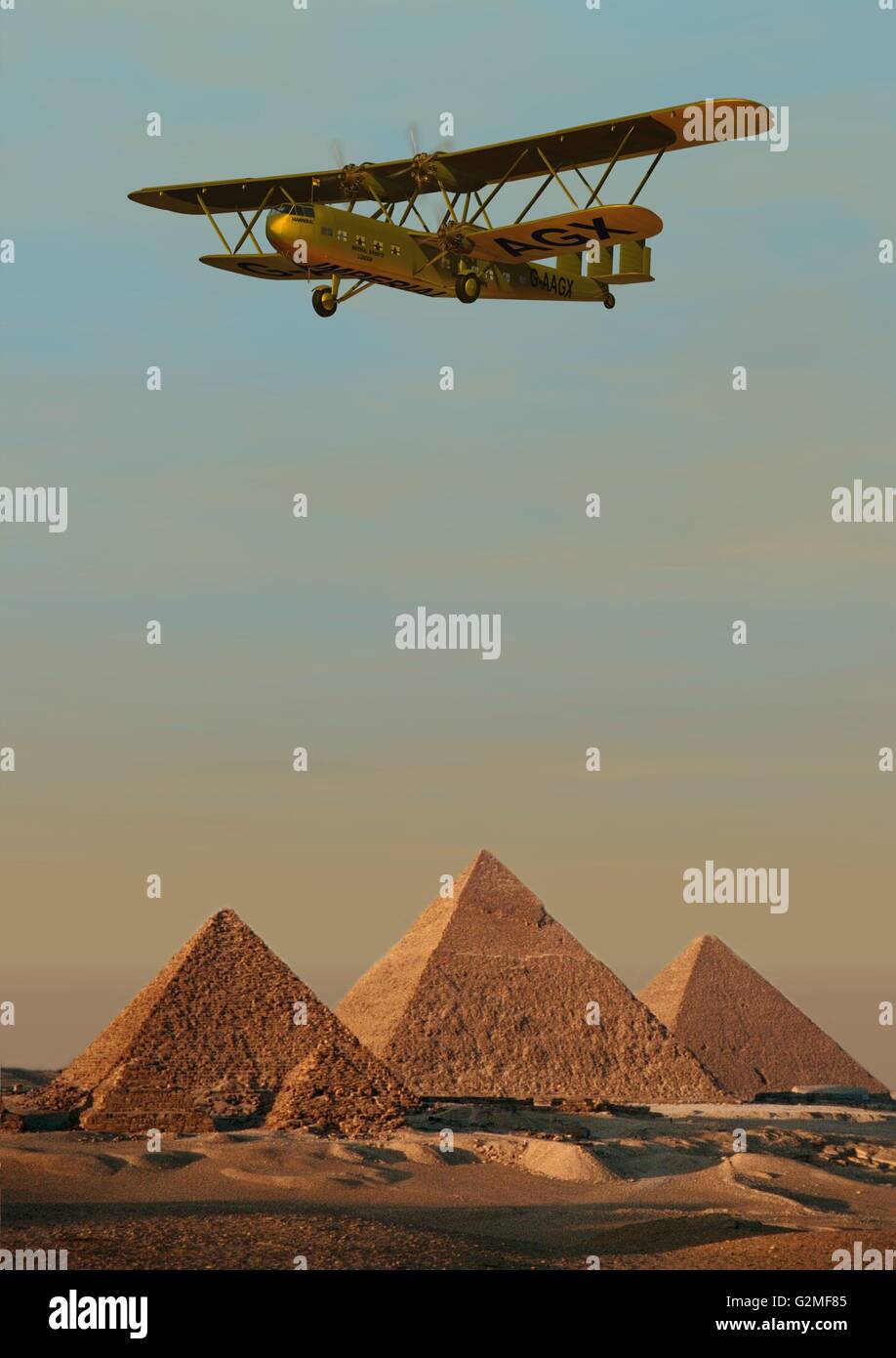 Airplane in sky over pyramids Stock Photo - Alamy