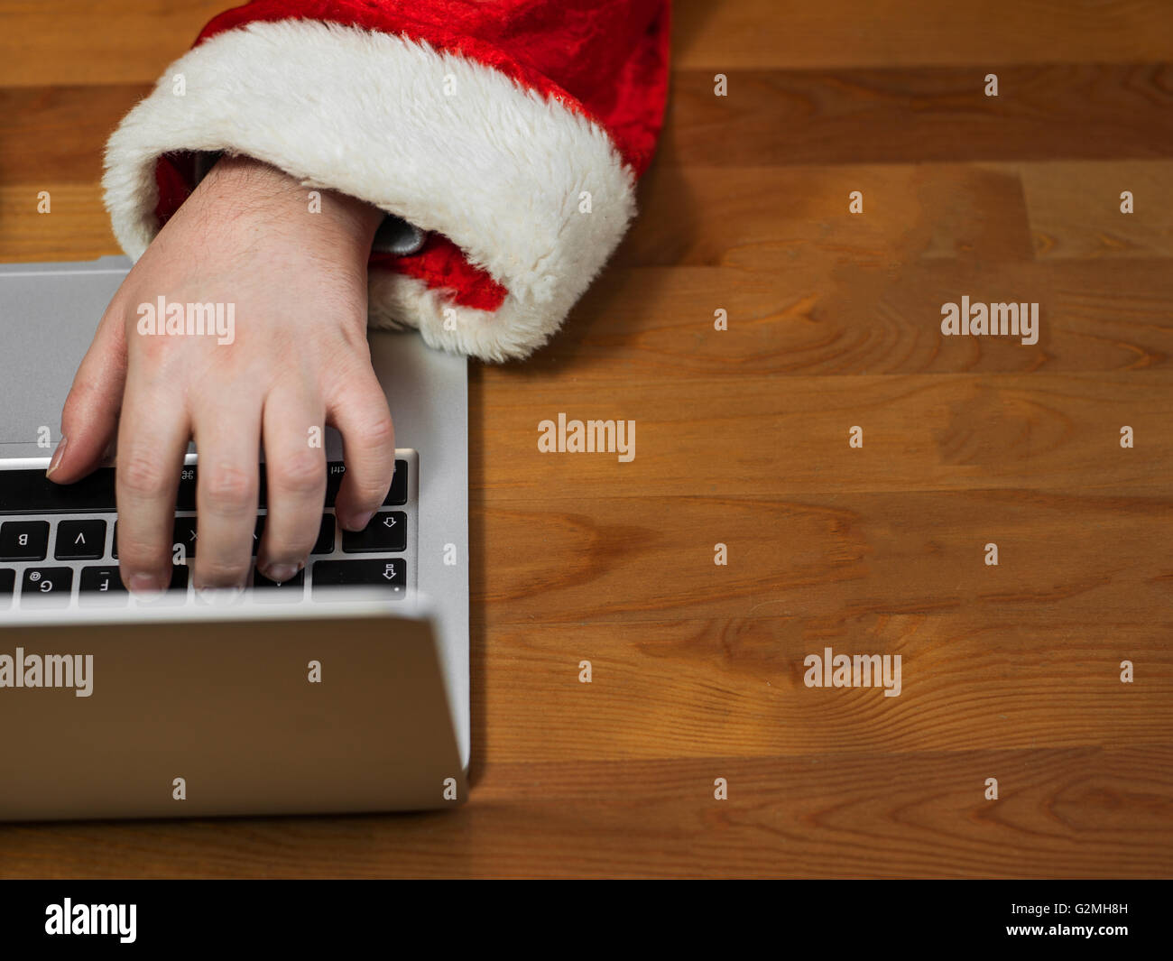 Modern laptop computer santa hi-res stock photography and images - Alamy