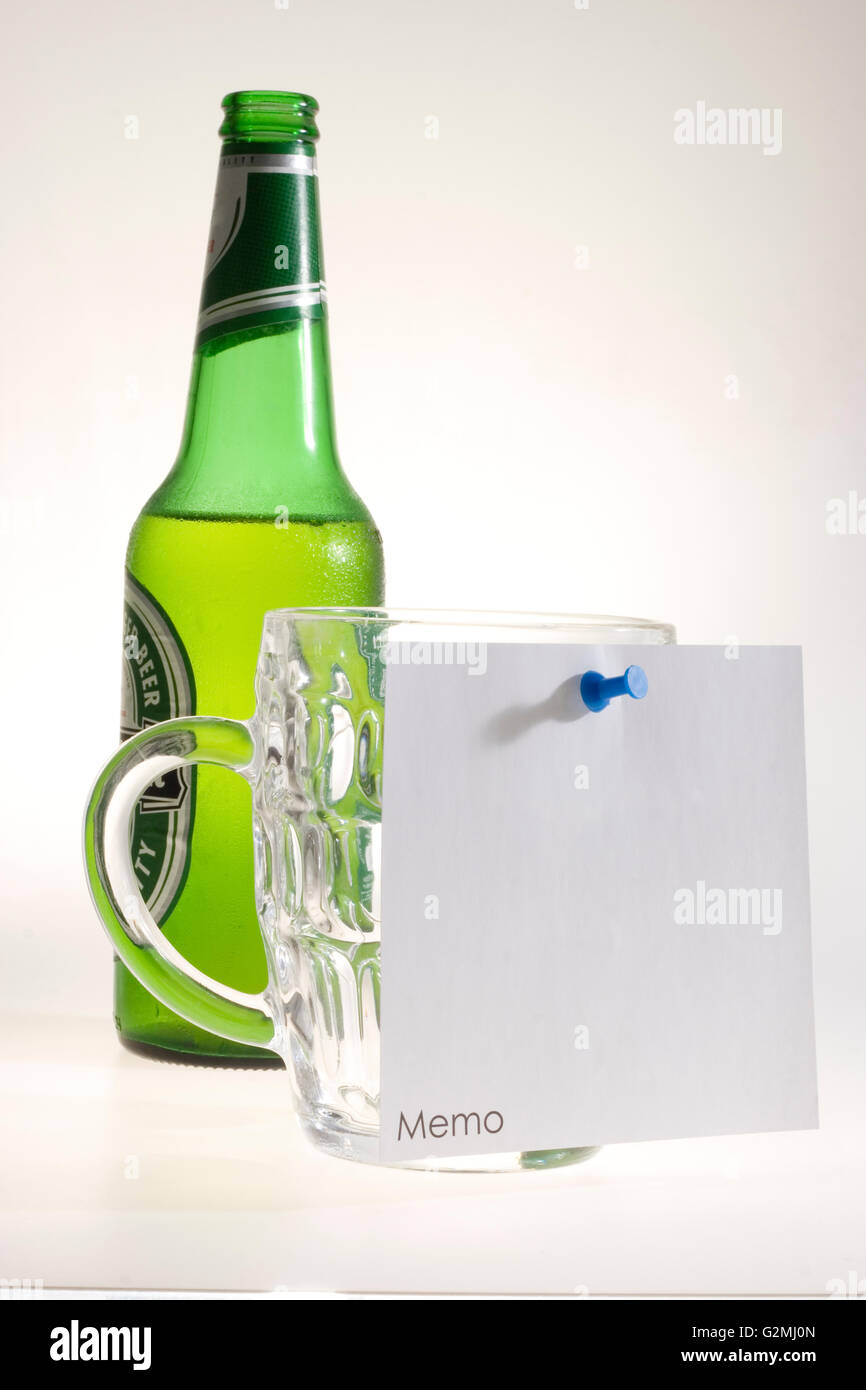 beer a mug and memo note Stock Photo - Alamy