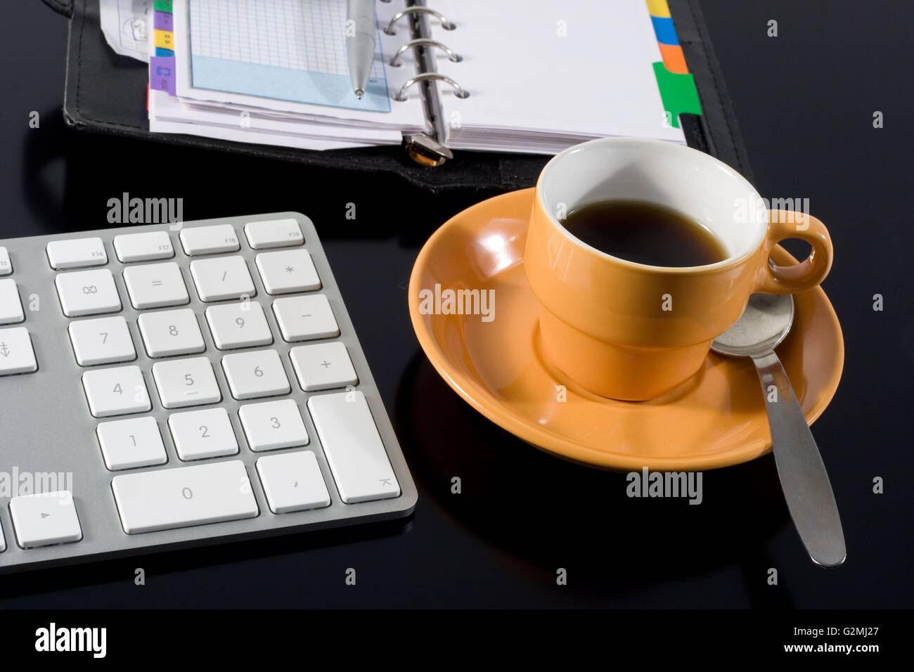 Keyboard computer notepad coffee hi-res stock photography and images ...