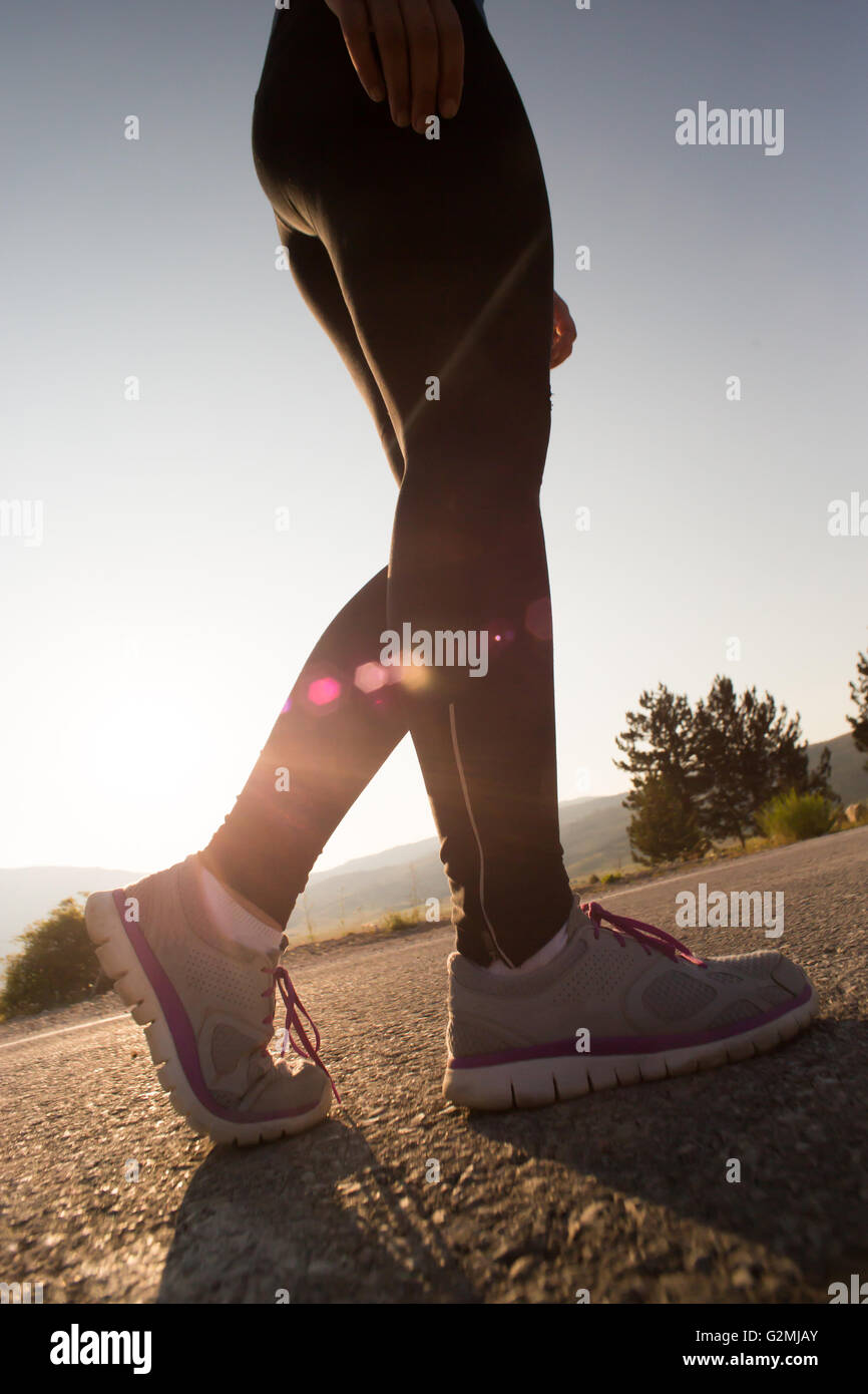 Young woman stretching before running in the early evening, instagram ...