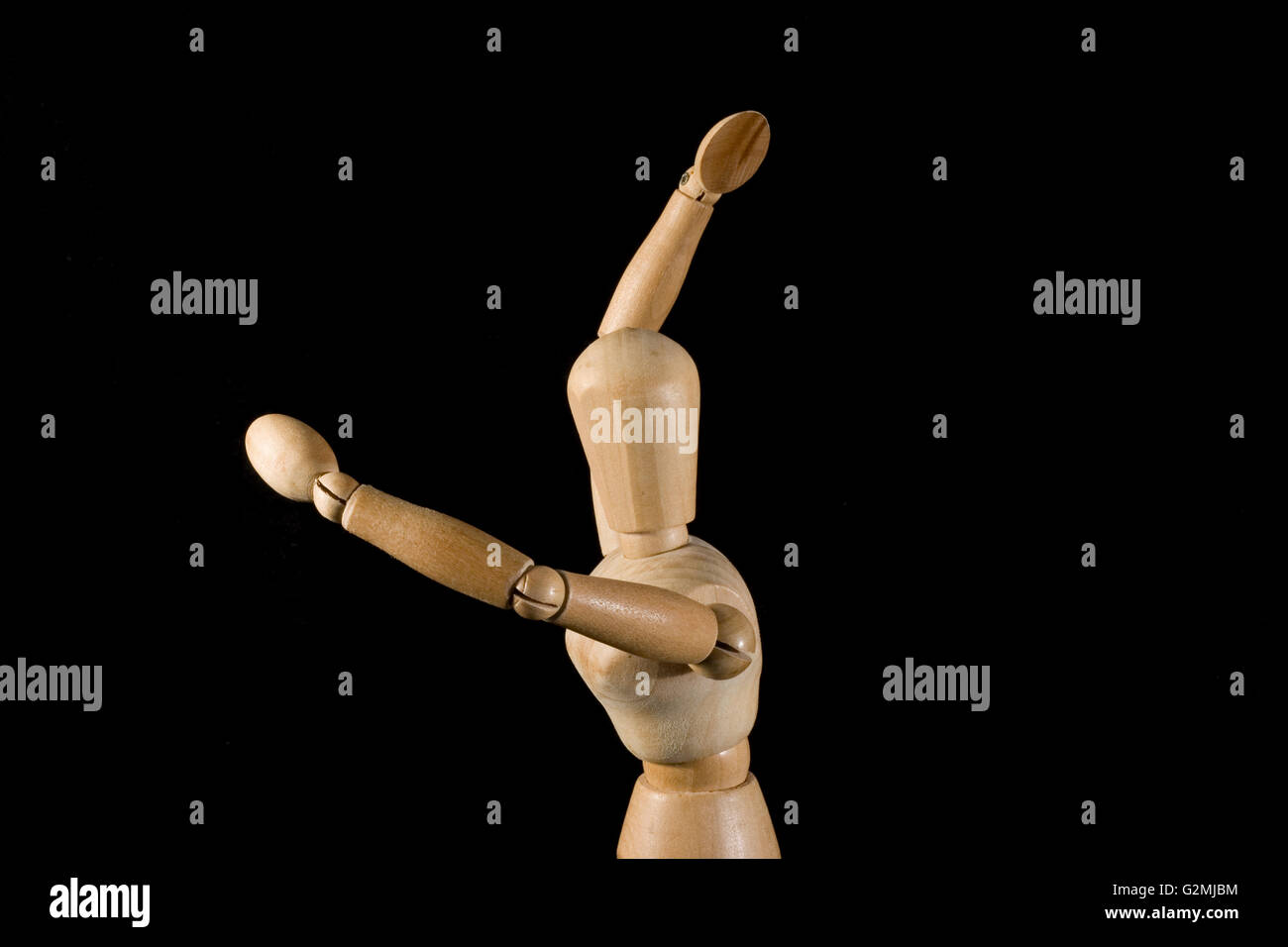 dancing wood puppet on black background Stock Photo - Alamy