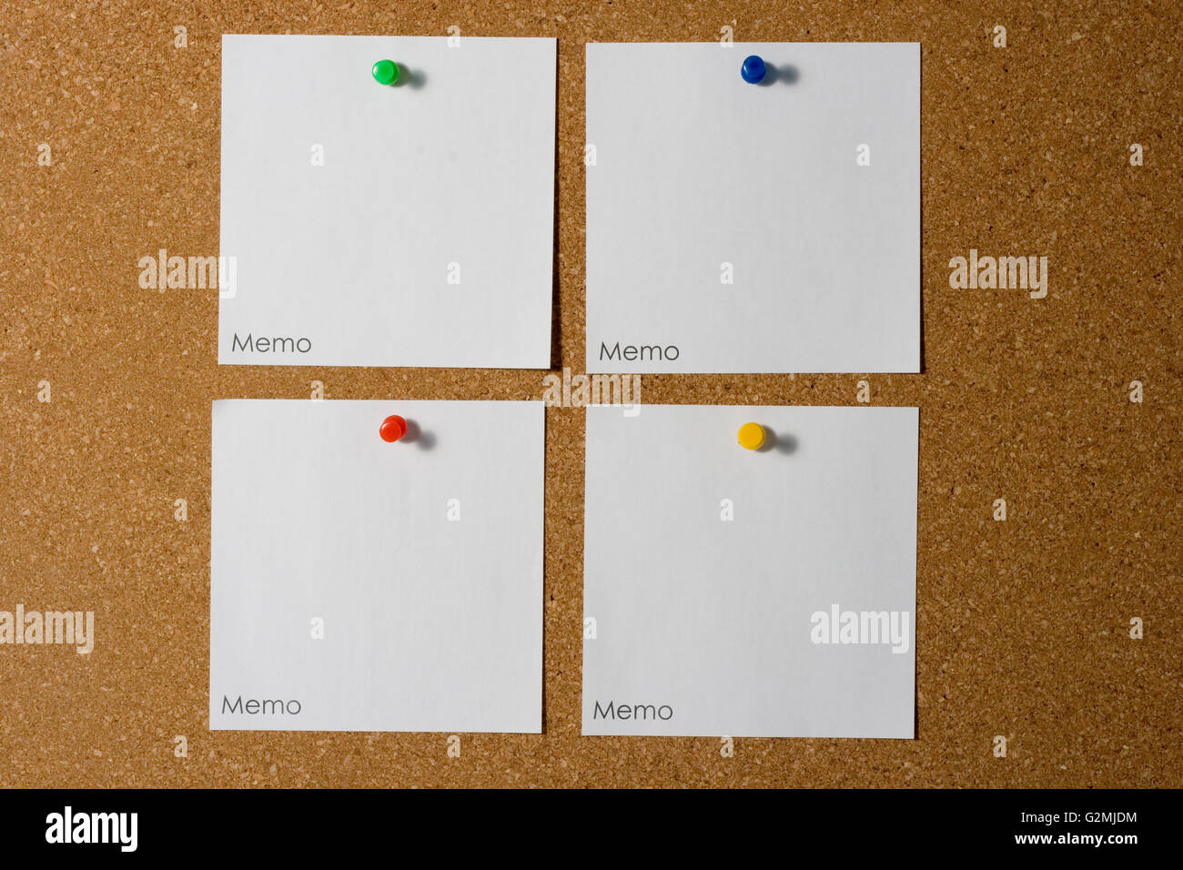 four reminders with collored pins Stock Photo - Alamy