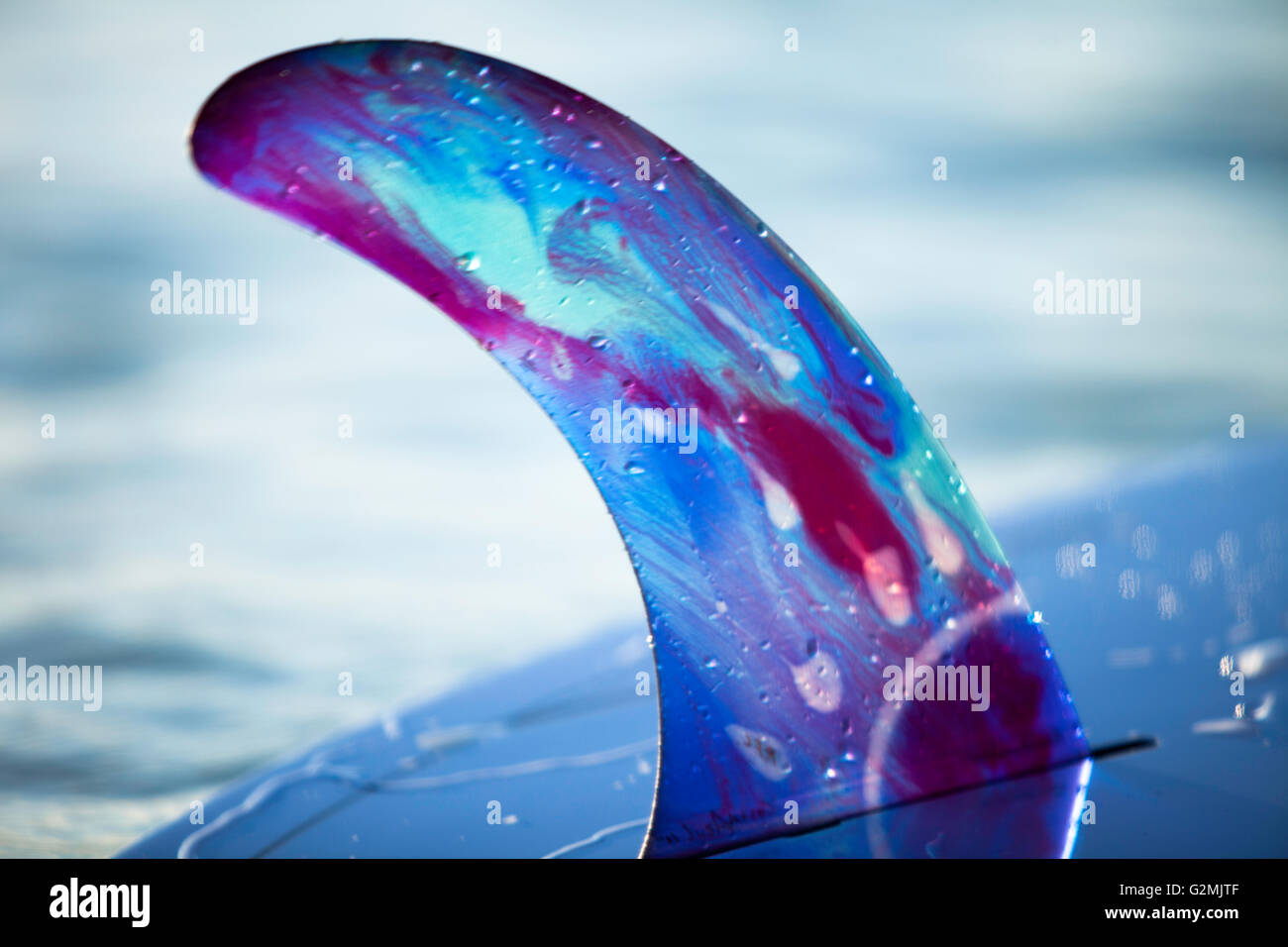 Closeup of Rainbow Fin Company single fin(skeg) on custom Kanaiupuni ...