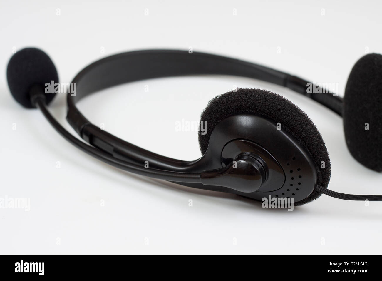 black headset with micrphone closeup on white background Stock Photo ...