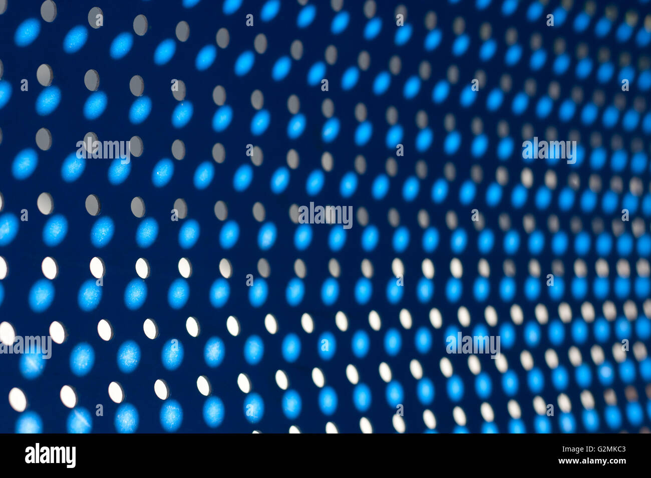 blue background with holes and light dots Stock Photo - Alamy