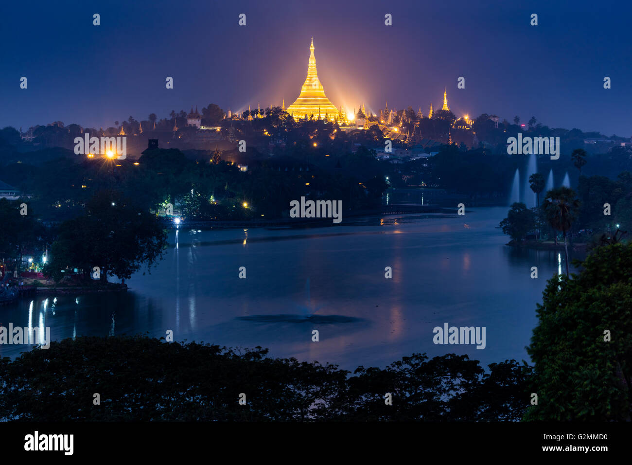 Shwedagon pagoda with lake reflection at night, Yangon,Myanmar Stock ...