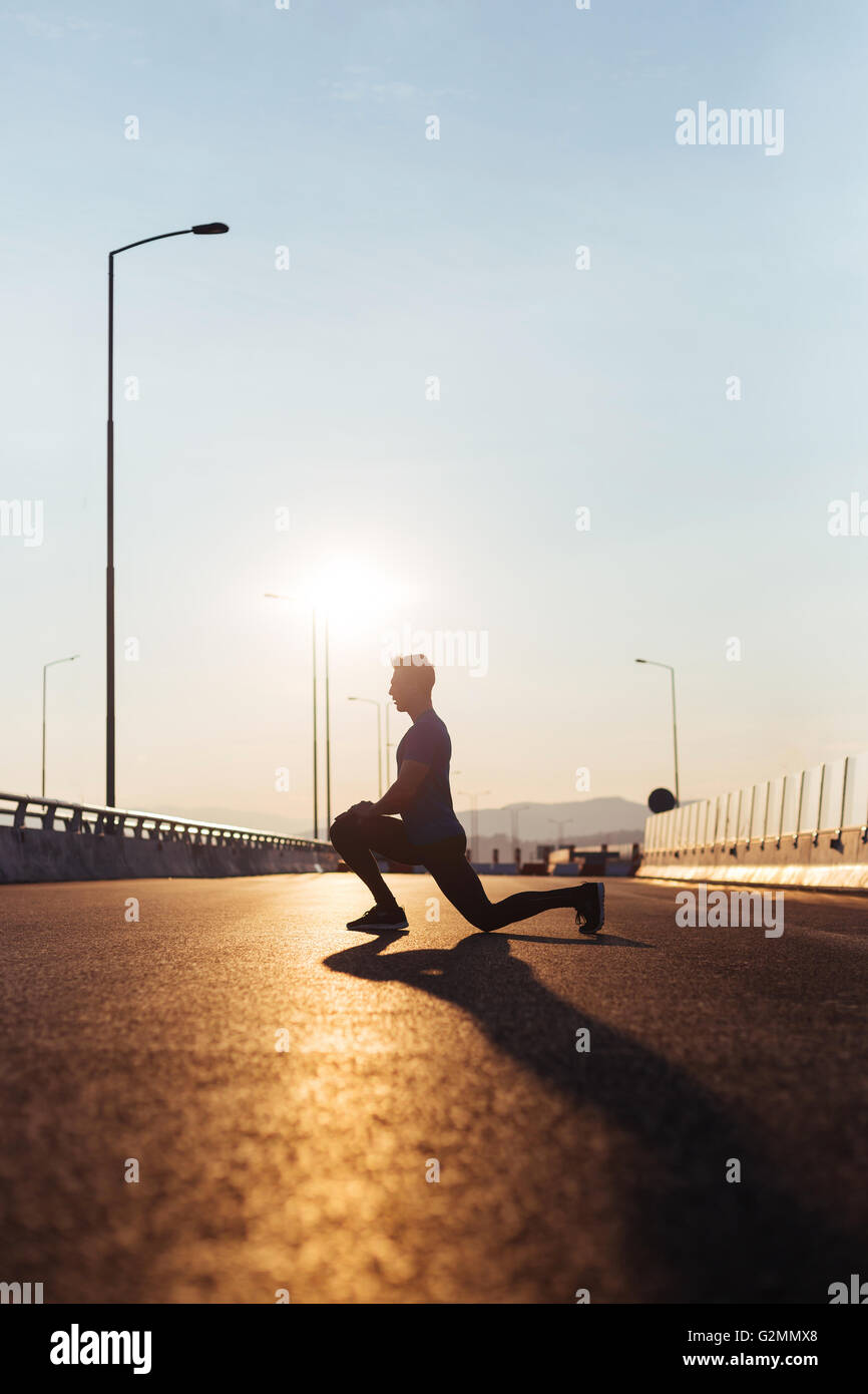 Male runner silhouette, Man running into sunset, colorful sunset sky ...