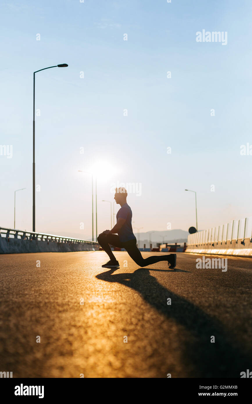 Male runner silhouette, Man running into sunset, colorful sunset sky ...