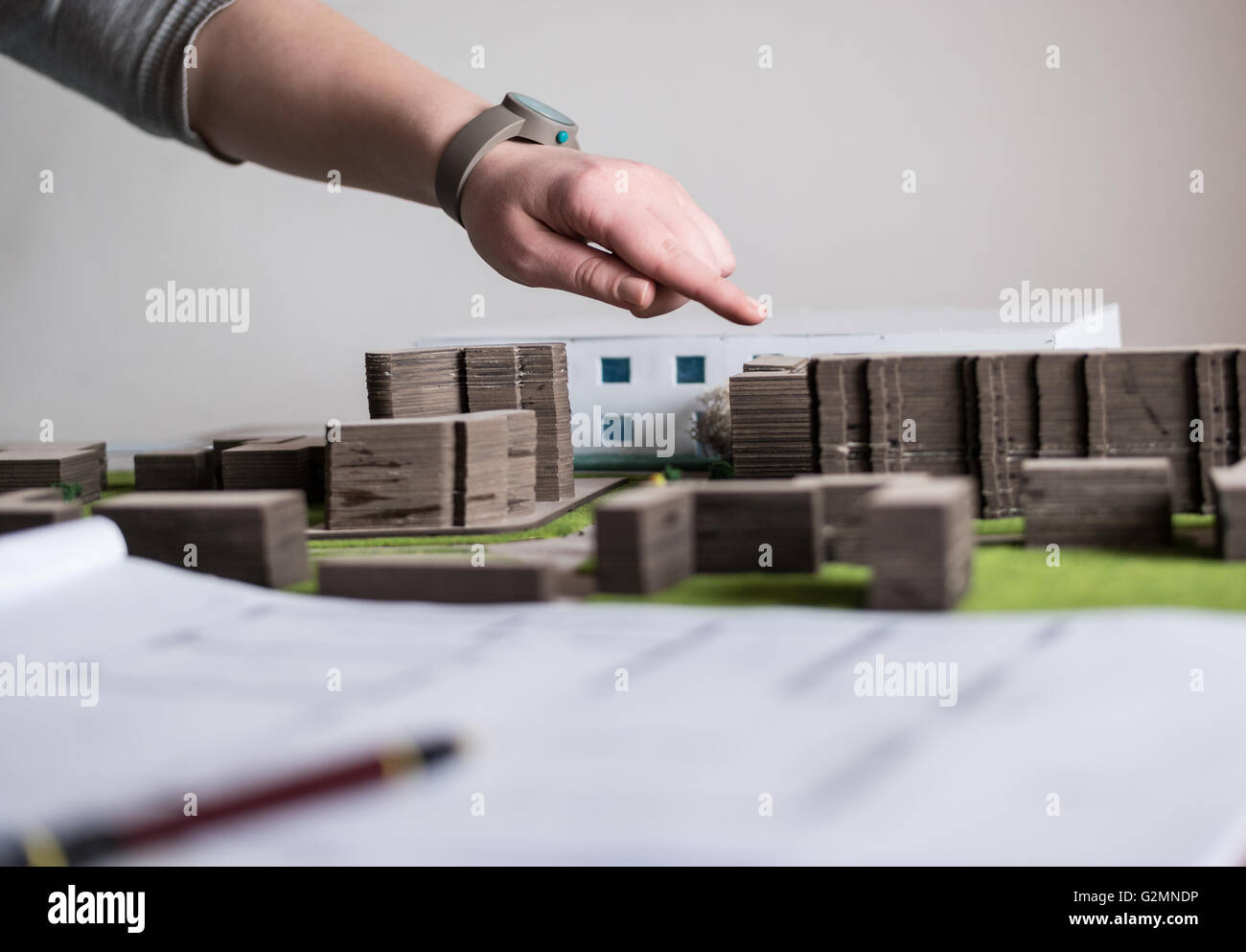 Model house, construction plan for house building, keys and clipboard ...