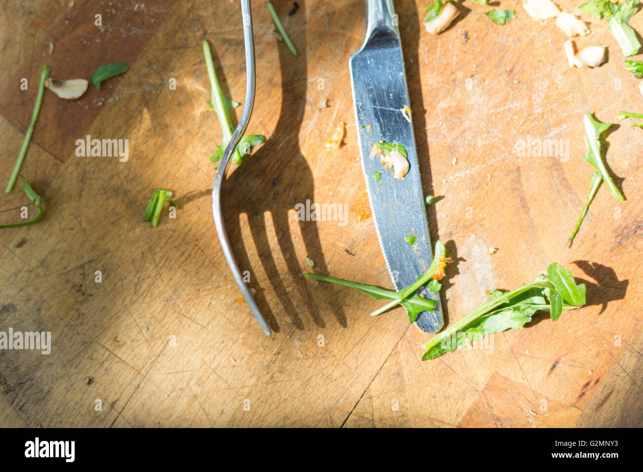 Empty wooden dish after food on wooden table Stock Photo - Alamy