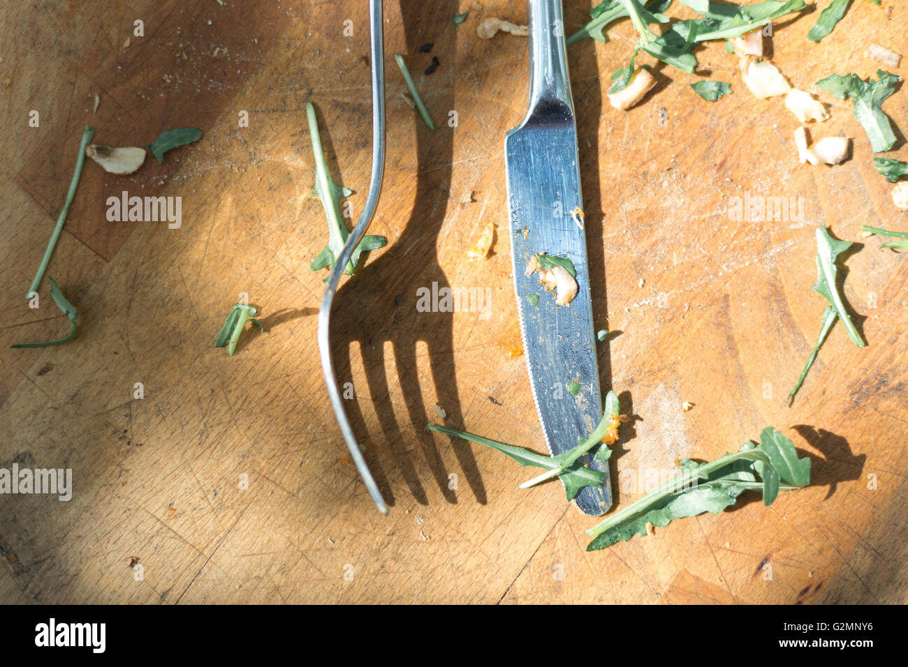 Empty wooden dish after food on wooden table Stock Photo - Alamy