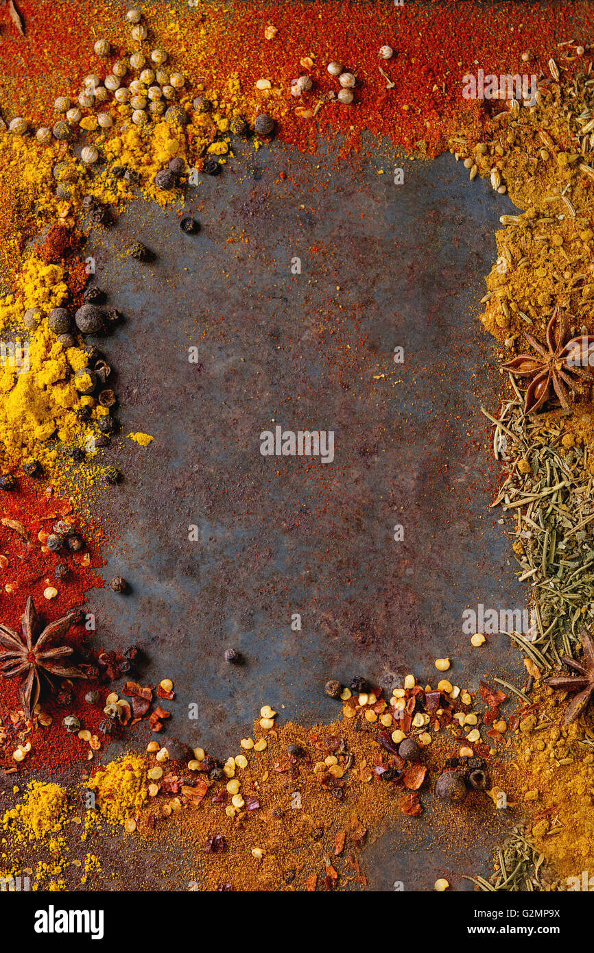 Spicy background with chili peppers Stock Photo - Alamy