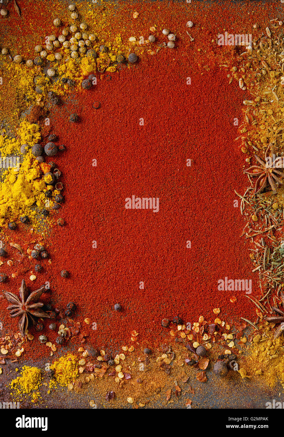 Spicy background with chili peppers Stock Photo - Alamy