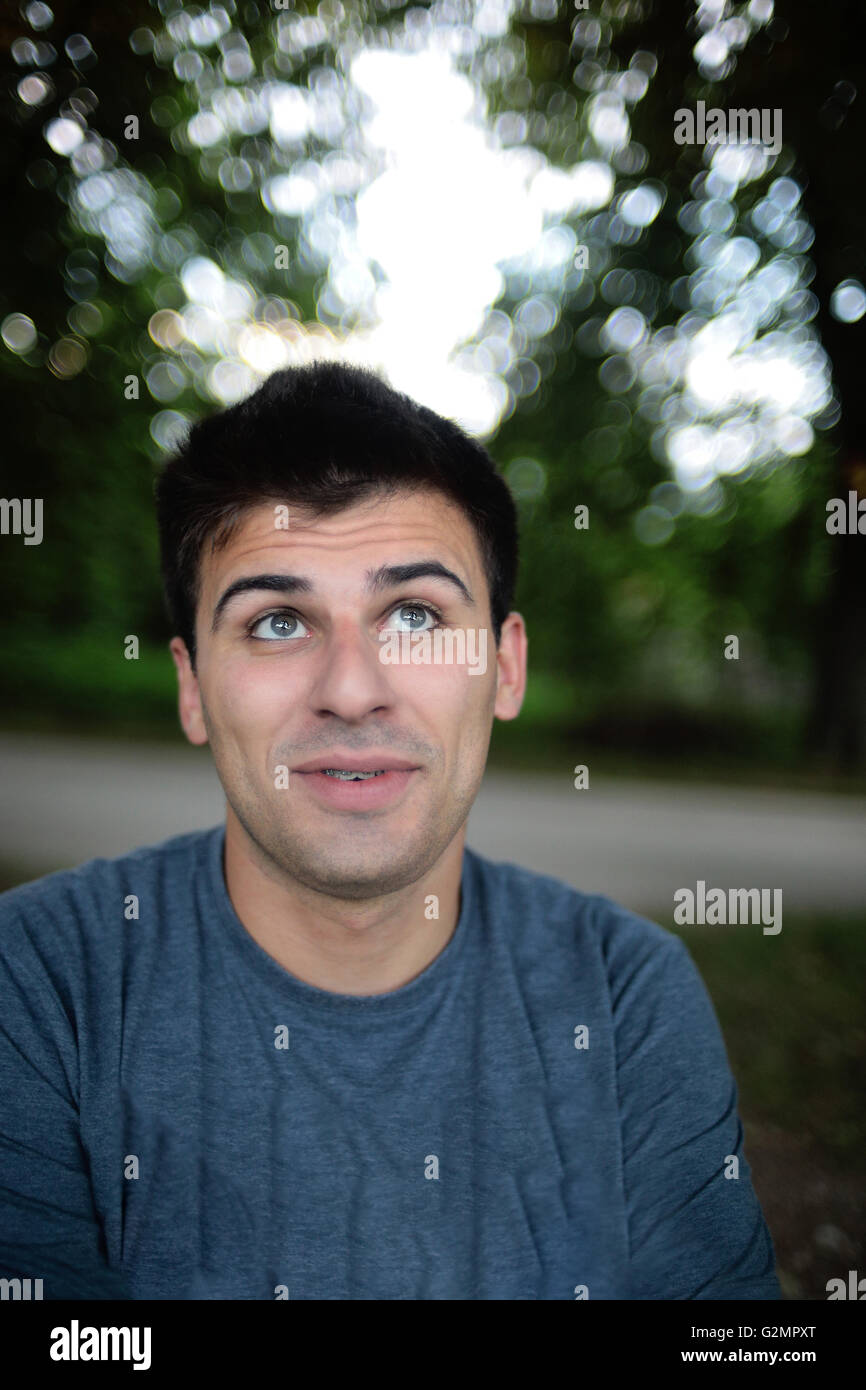 Portrait of handsome man looking at camera Stock Photo - Alamy