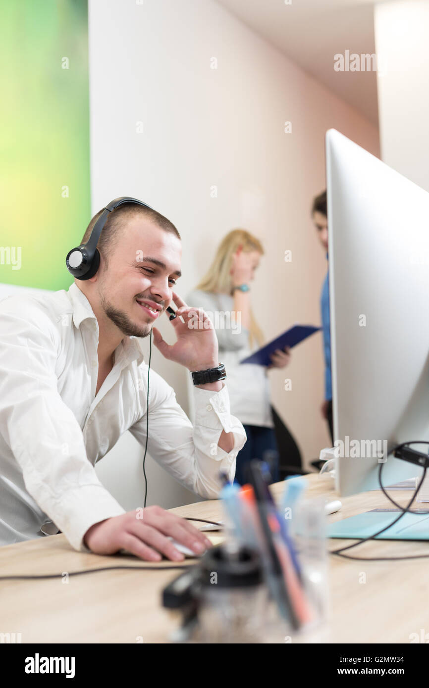 Operator using a computer in a call center Stock Photo - Alamy