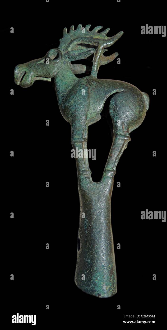 Bronze pole-top in the form of an elk. Ordos type, 6th century BC ...