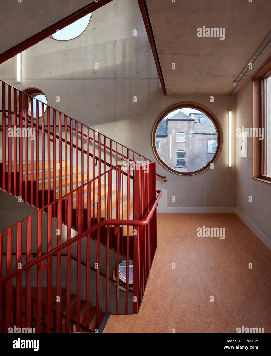 Stairwell and concrete walls with circular windows. St Angela's College ...