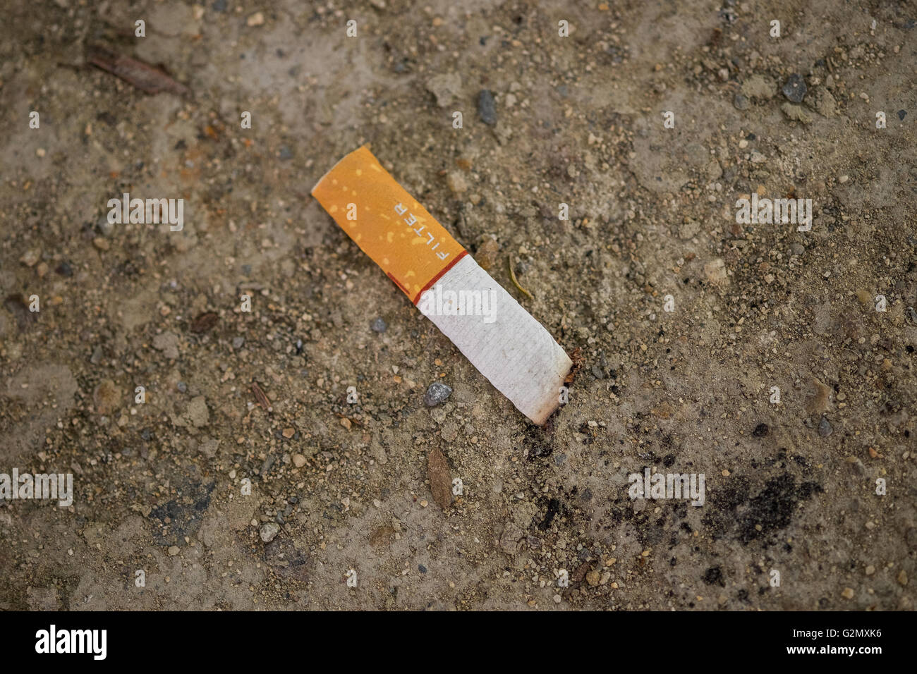 smoked cigarettes in the sand(Selective focus Stock Photo - Alamy