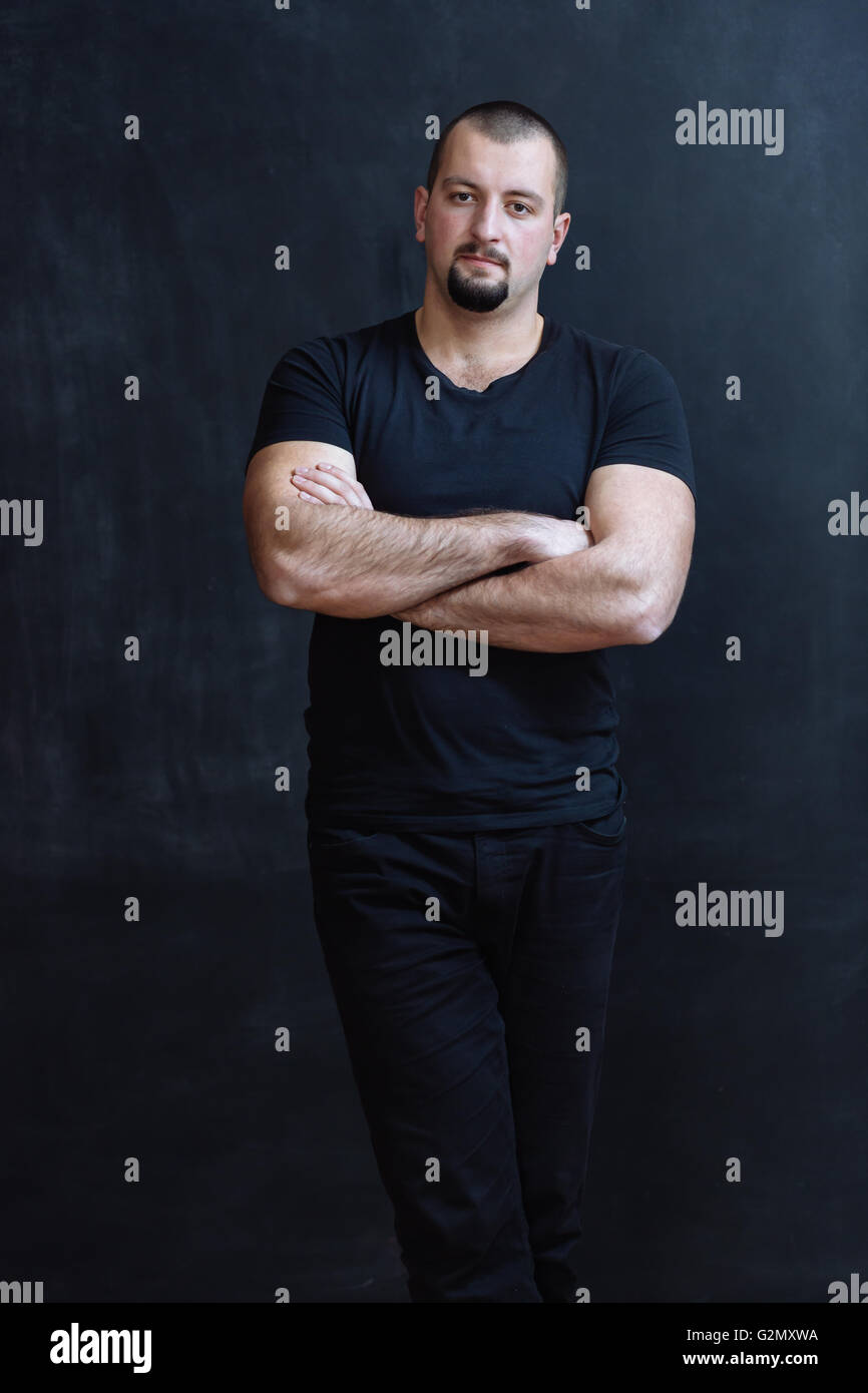 Handsome men doing different expressions on chalkboard Stock Photo - Alamy