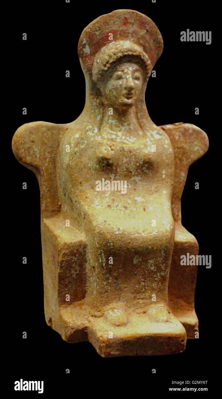Terracotta figure of woman or goddess seated on a throne. Made in ...