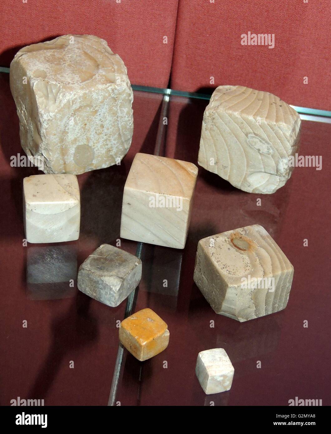 Selection of mineral items shaped into cubes 11th Century A.D Stock ...