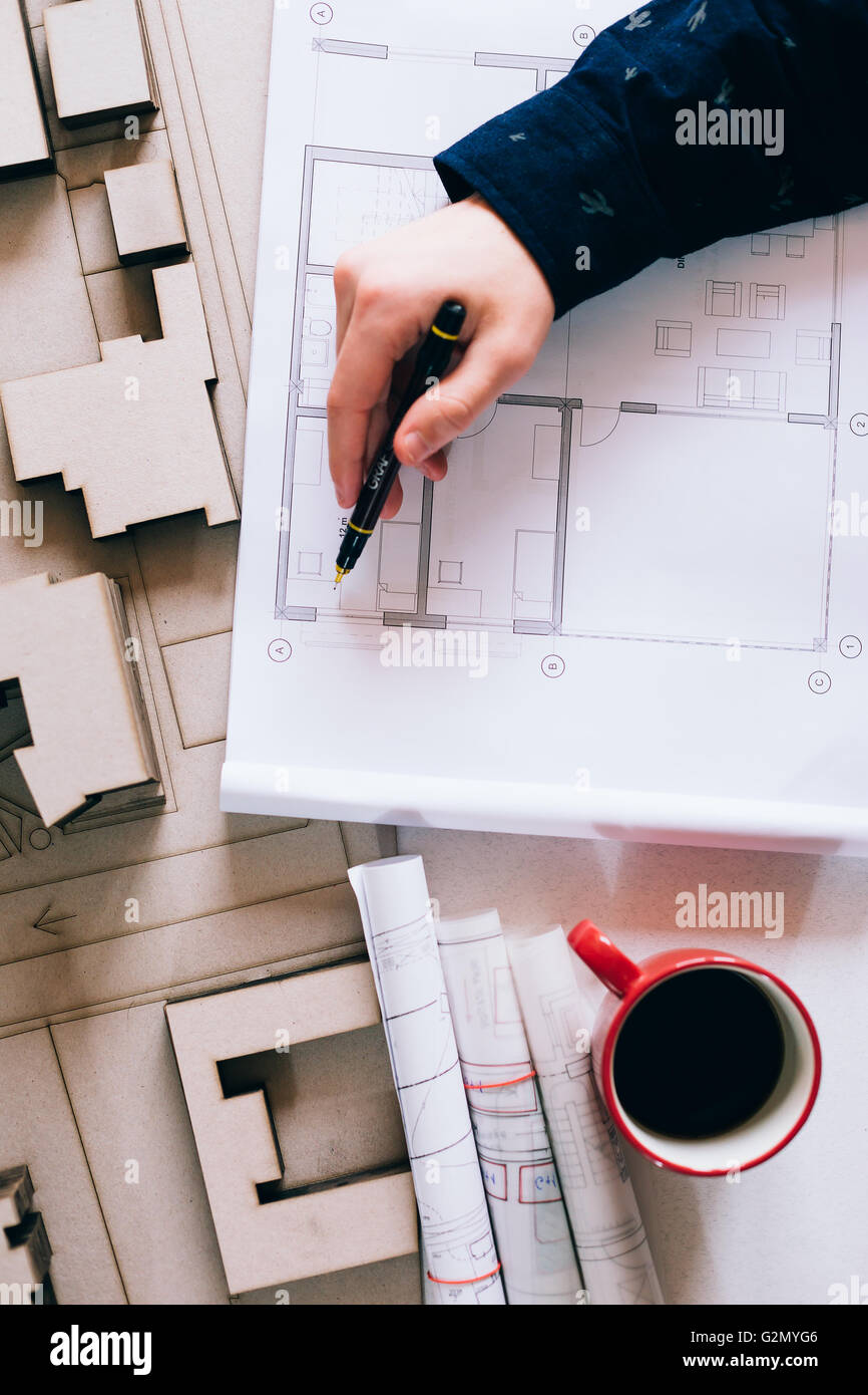 Top view of architect drawing on architectural project Stock Photo - Alamy