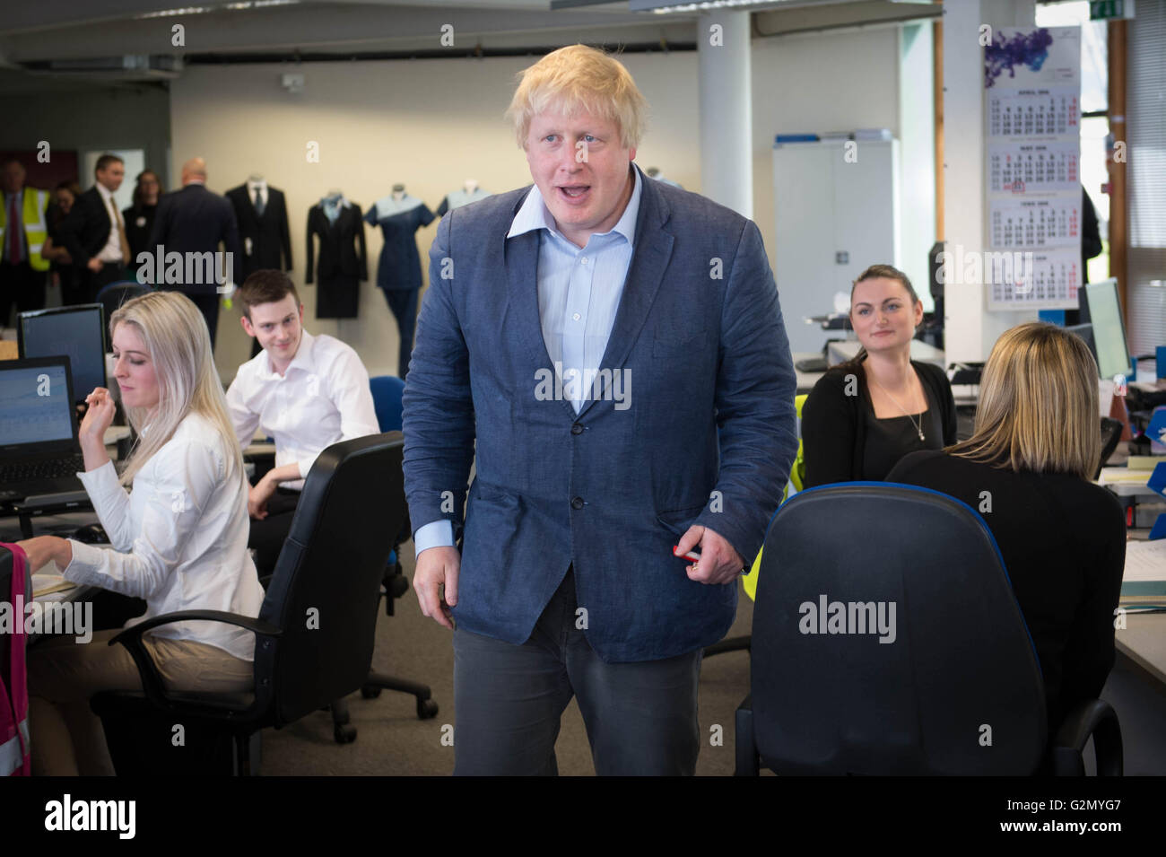 Boris Johnson meets workers at clothing and uniform manufacturers Simon ...