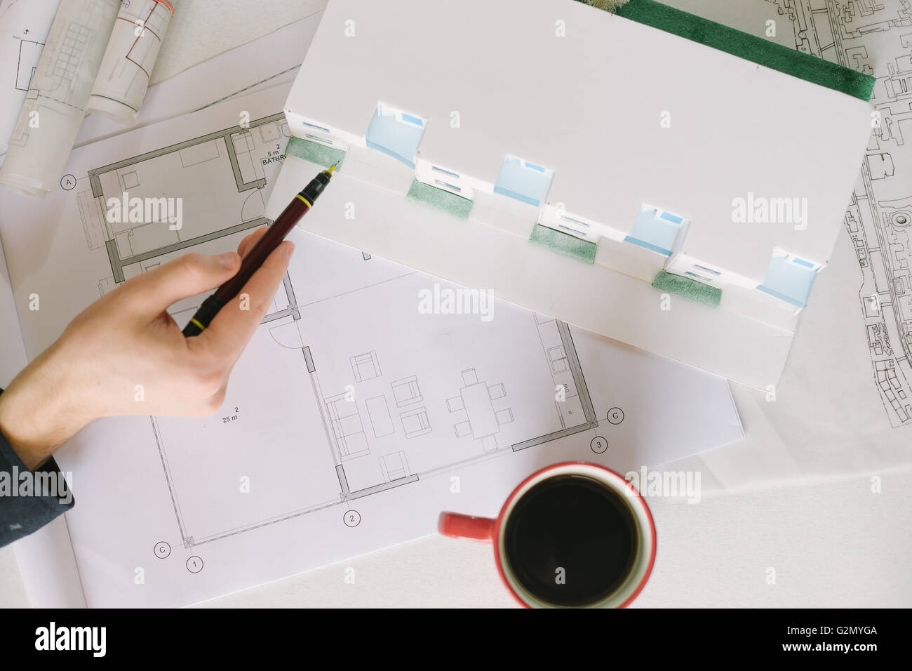 Top view of architect drawing on architectural project Stock Photo - Alamy