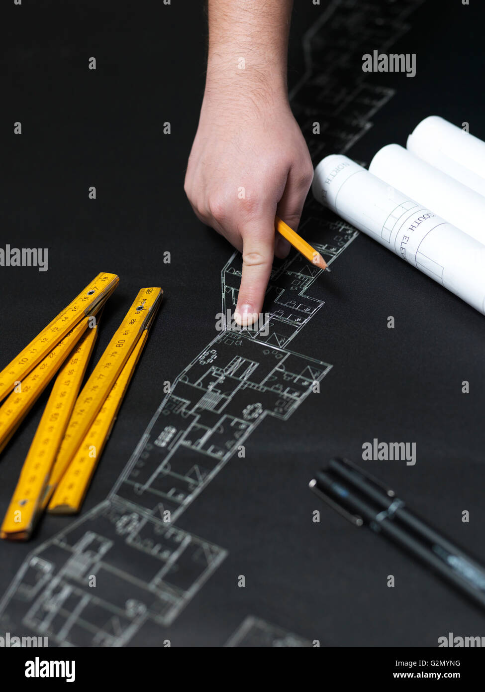 Business man draw buildings and present his architectural project Stock ...