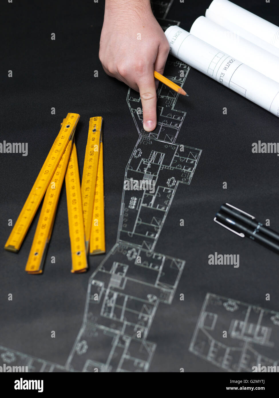 Business man draw buildings and present his architectural project Stock ...