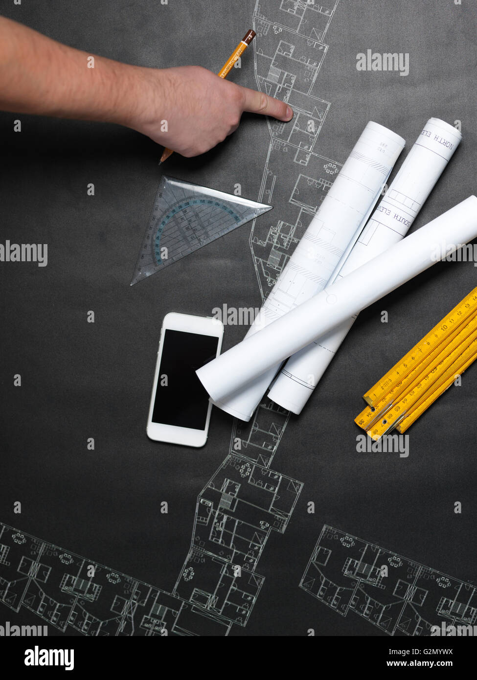 Business man draw buildings and present his architectural project Stock ...