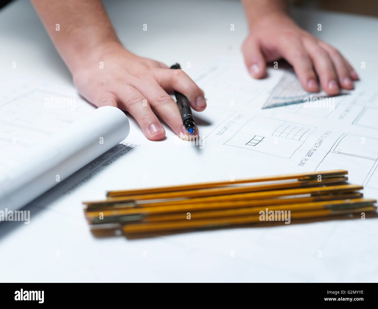Business man draw buildings and present his architectural project Stock ...