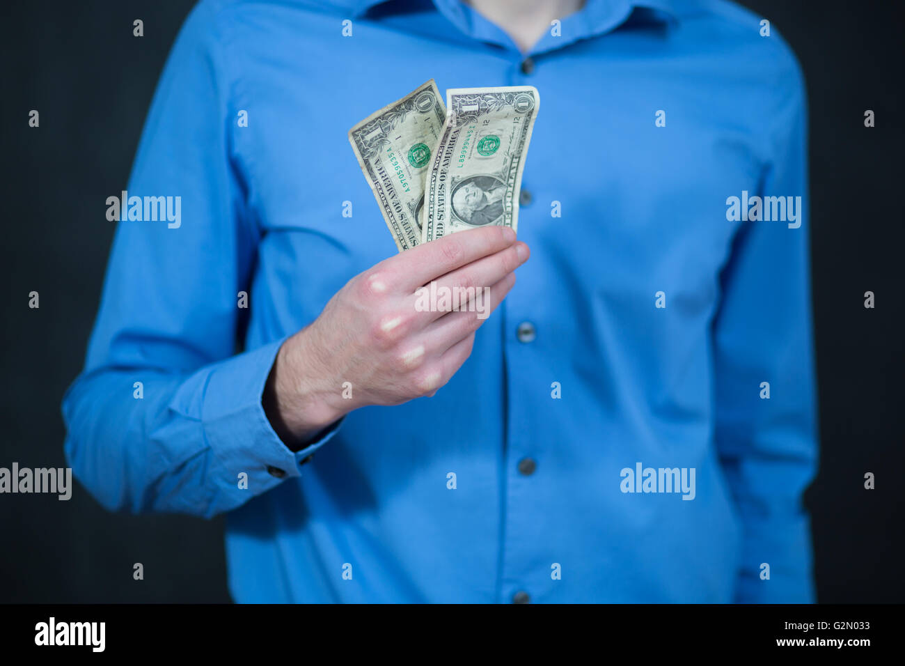 Concept - corruption. Giving a bribe. Money in hand Stock Photo - Alamy