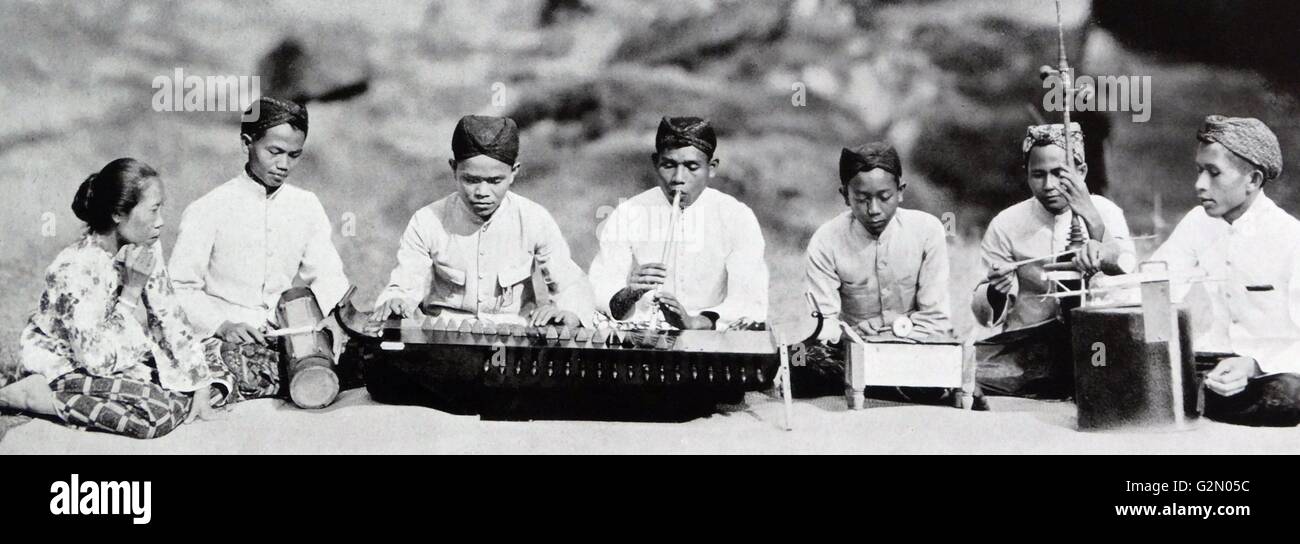 Photograph shows Indonesian musicians (Sundanese orchestra) sitting ...