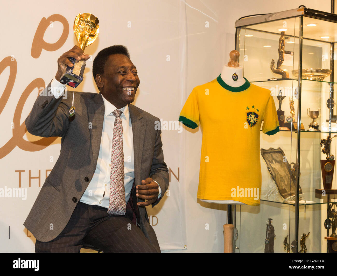 London, UK. 1 June 2016. Pele holds his copy of the Jules Rimet Trophy ...