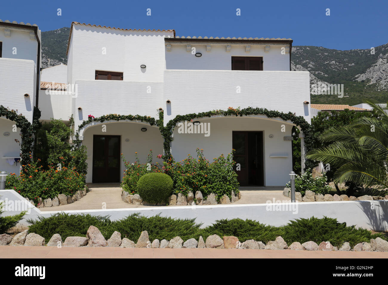A holiday hotel in tropical gardens, Sardinia island, Italy Stock Photo ...