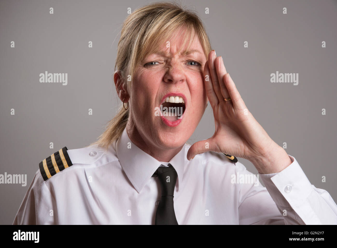 Shouting orders hi-res stock photography and images - Alamy