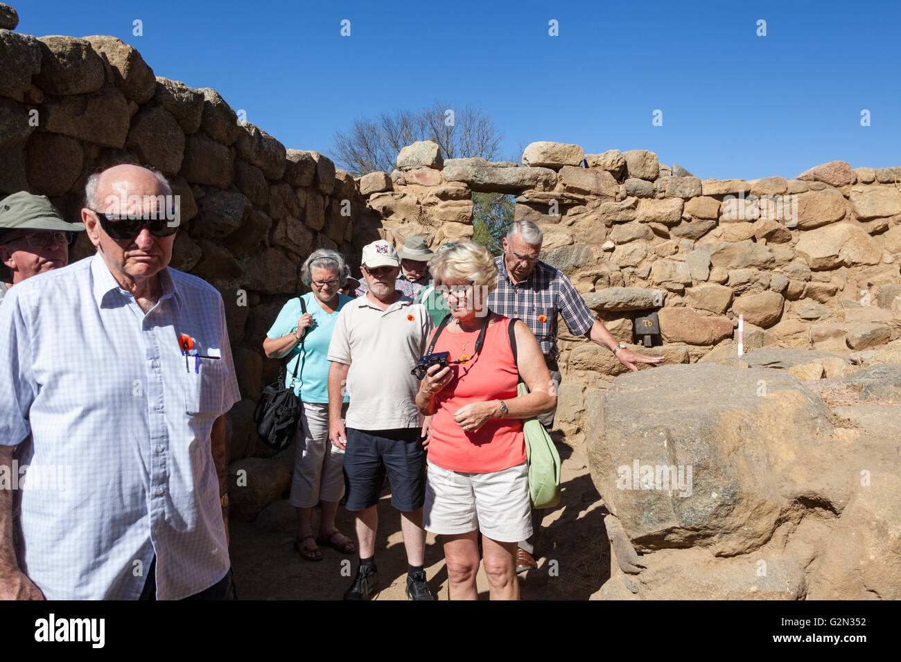 Tourists visiting Nuraghe La Prisgiona Archaeological Site, Arzachena ...