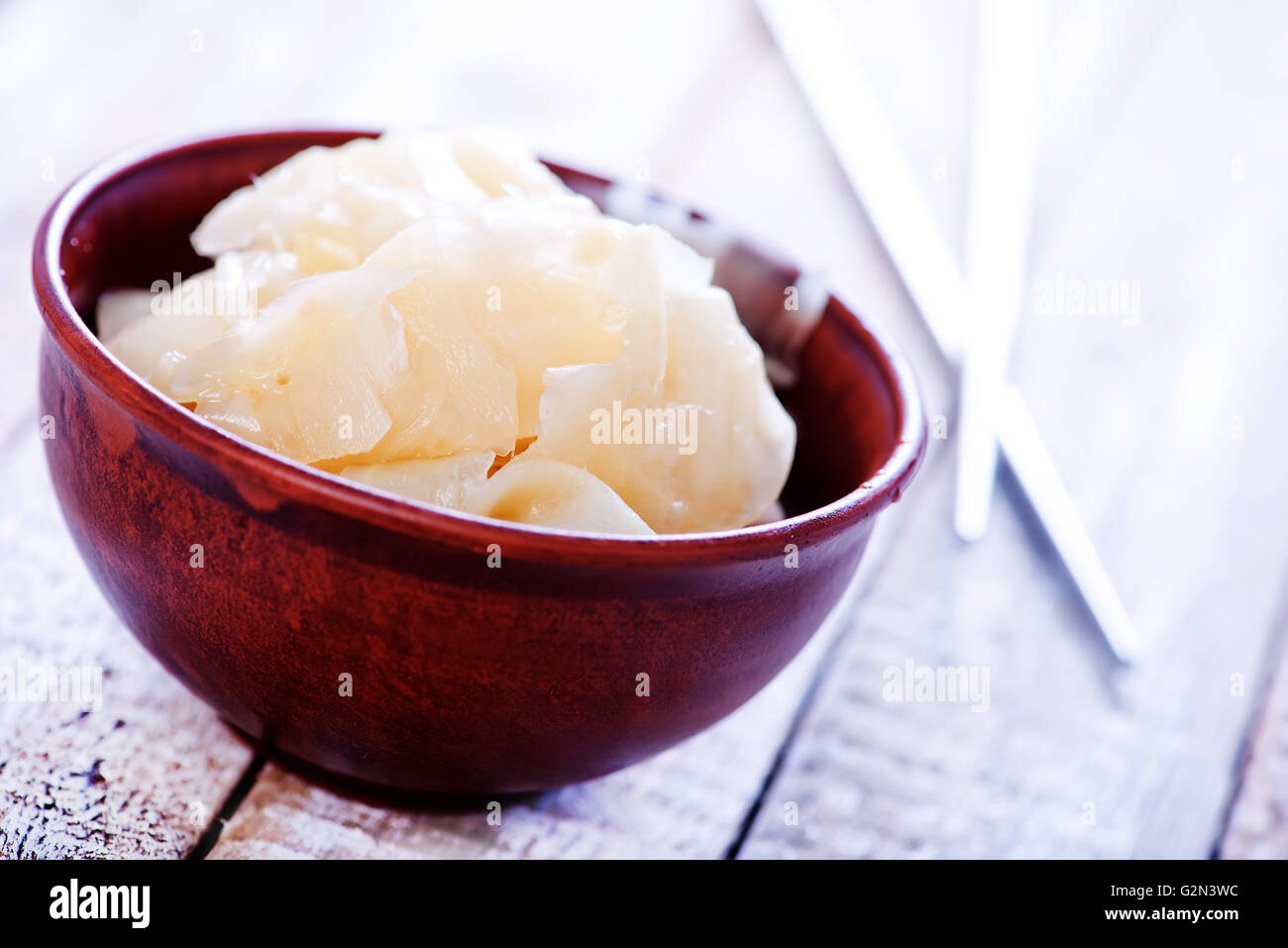 ginger in bowl and on a table Stock Photo - Alamy