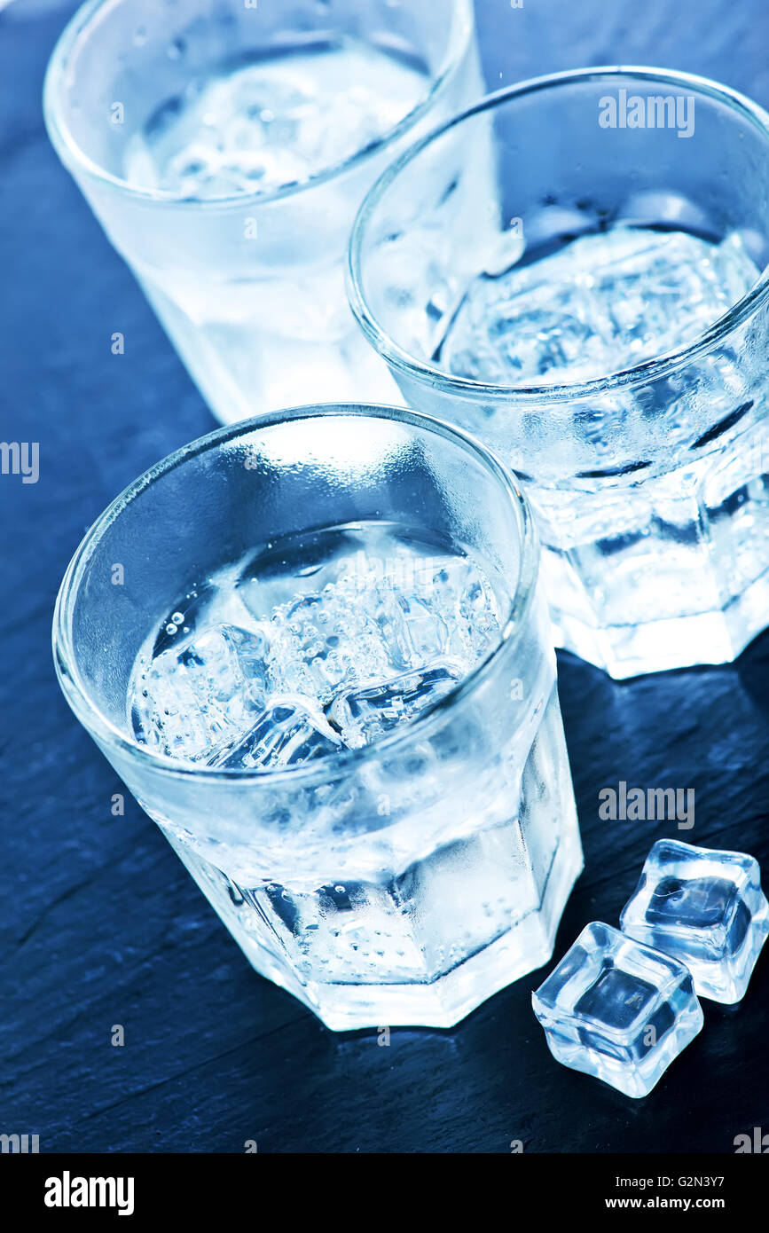 cold water with ice cubes in the glass Stock Photo - Alamy