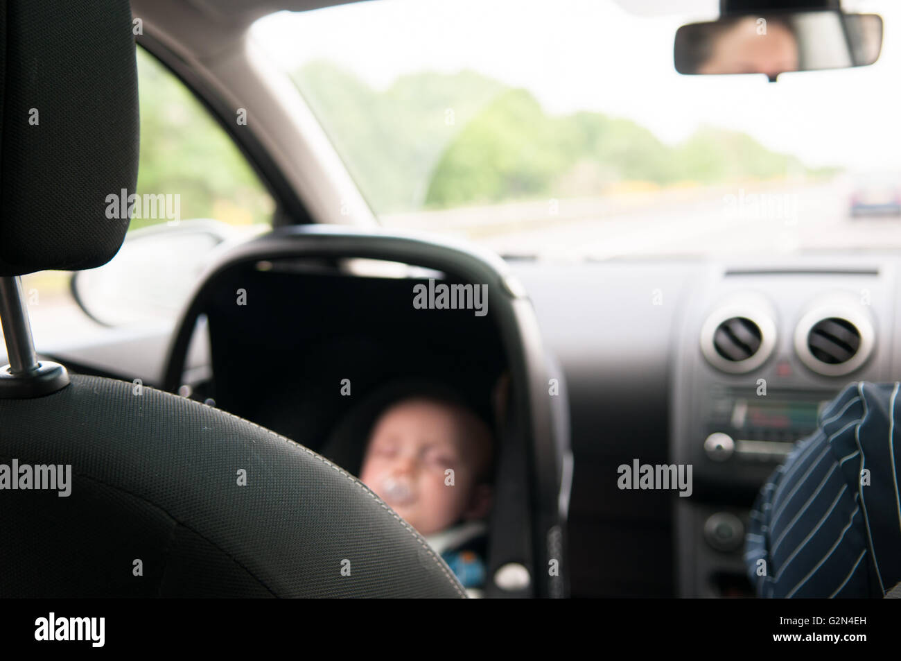 Rear facing family hi-res stock photography and images - Alamy