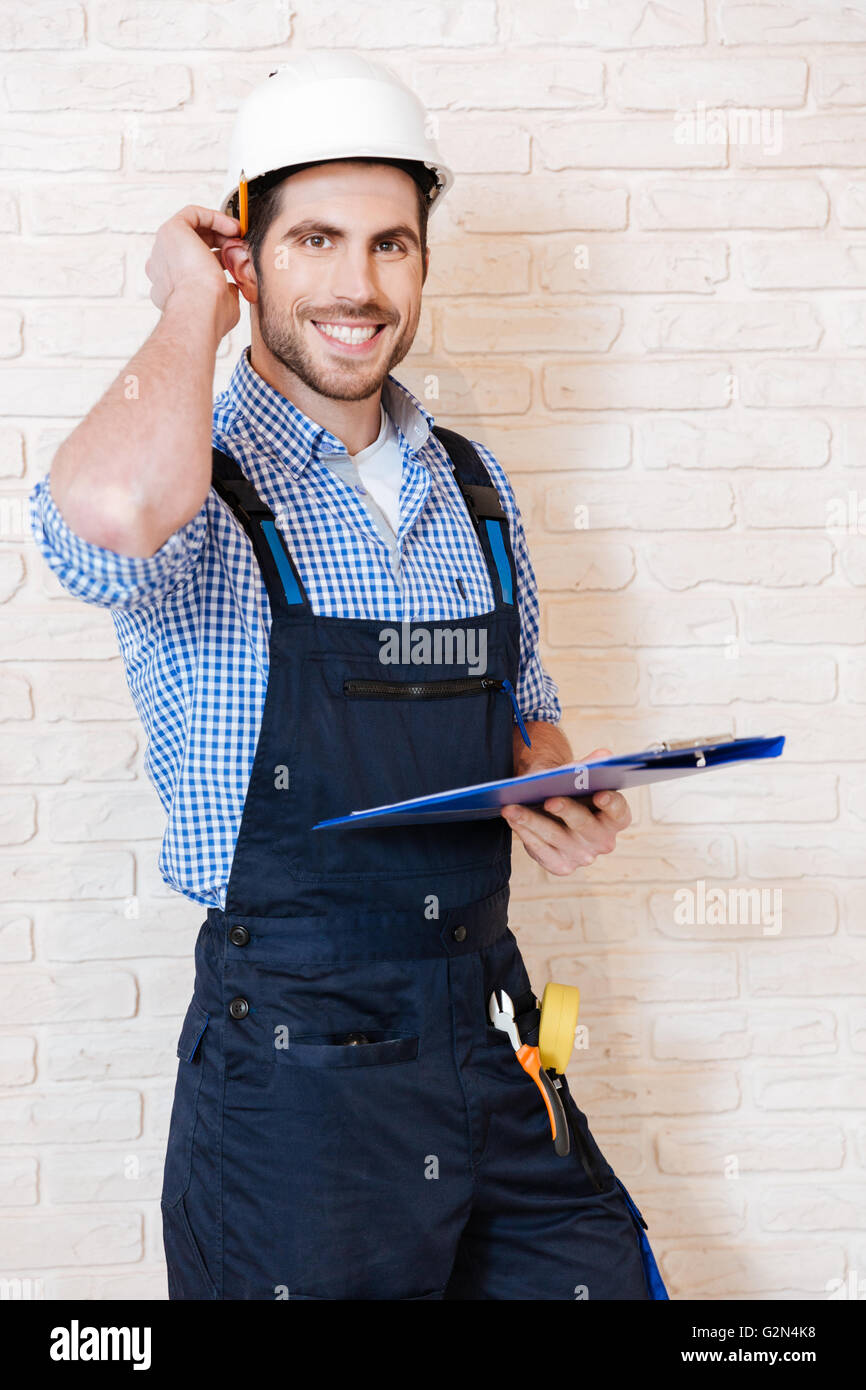 Construction worker taking notes hi-res stock photography and images ...