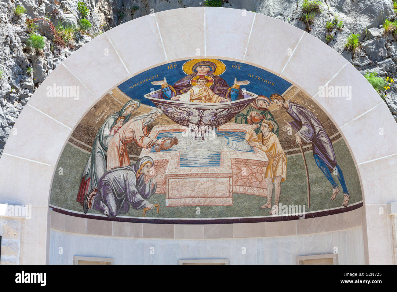 arch decorated with mosaics - entrance to the monastery Ostrog Stock ...